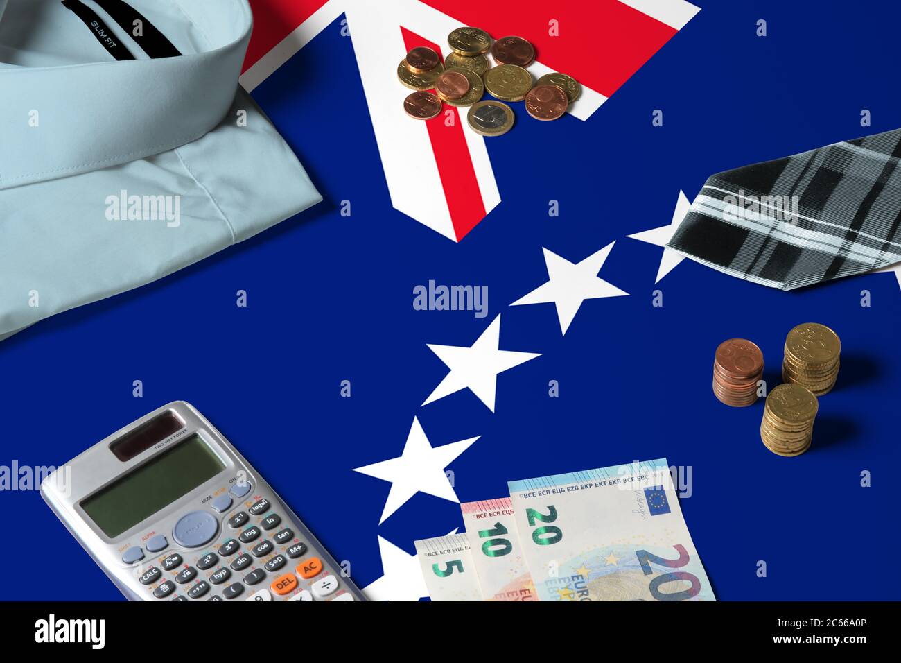 Cook Islands flag on minimal money concept table. Coins and financial ...