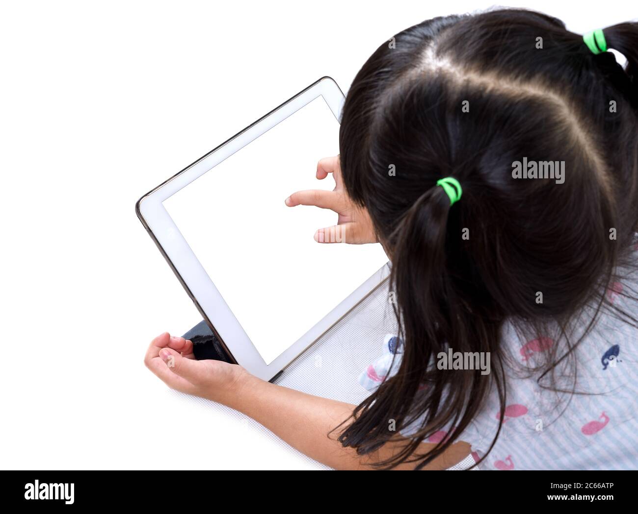 Close up hand little girl touch screen the tablet isolated on white ...