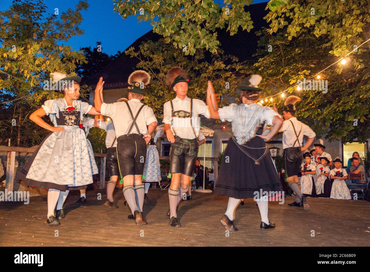 Dancing at the traditional evening in the beer garden of the Altwirt in ...