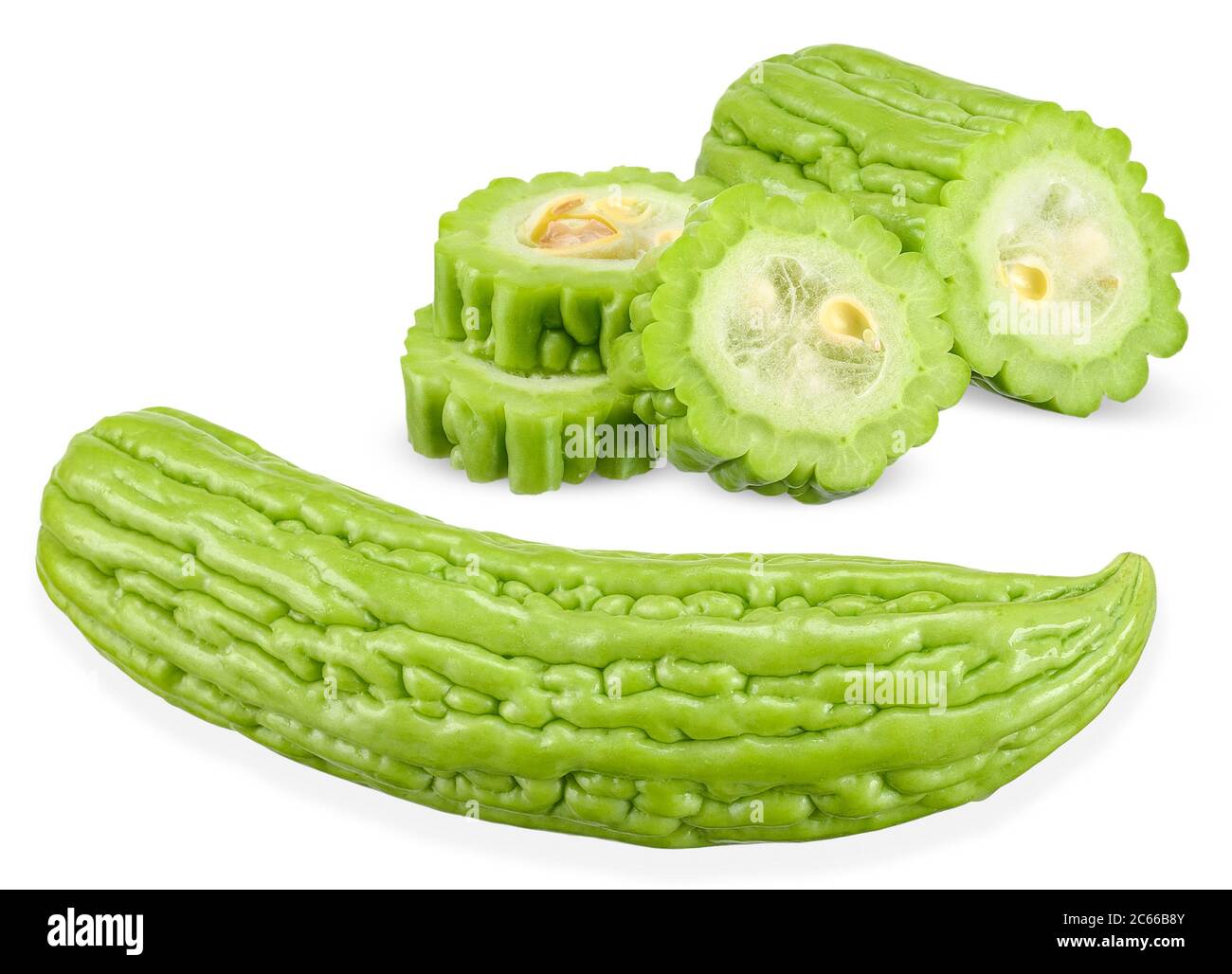Bitter gourd and slice isolated on white background Stock Photo - Alamy