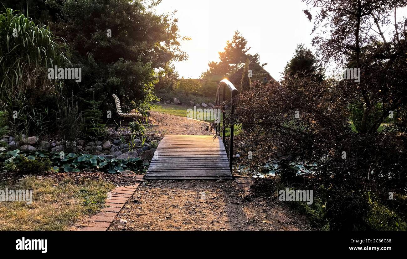 Footbridge across a small brook hi-res stock photography and images - Alamy