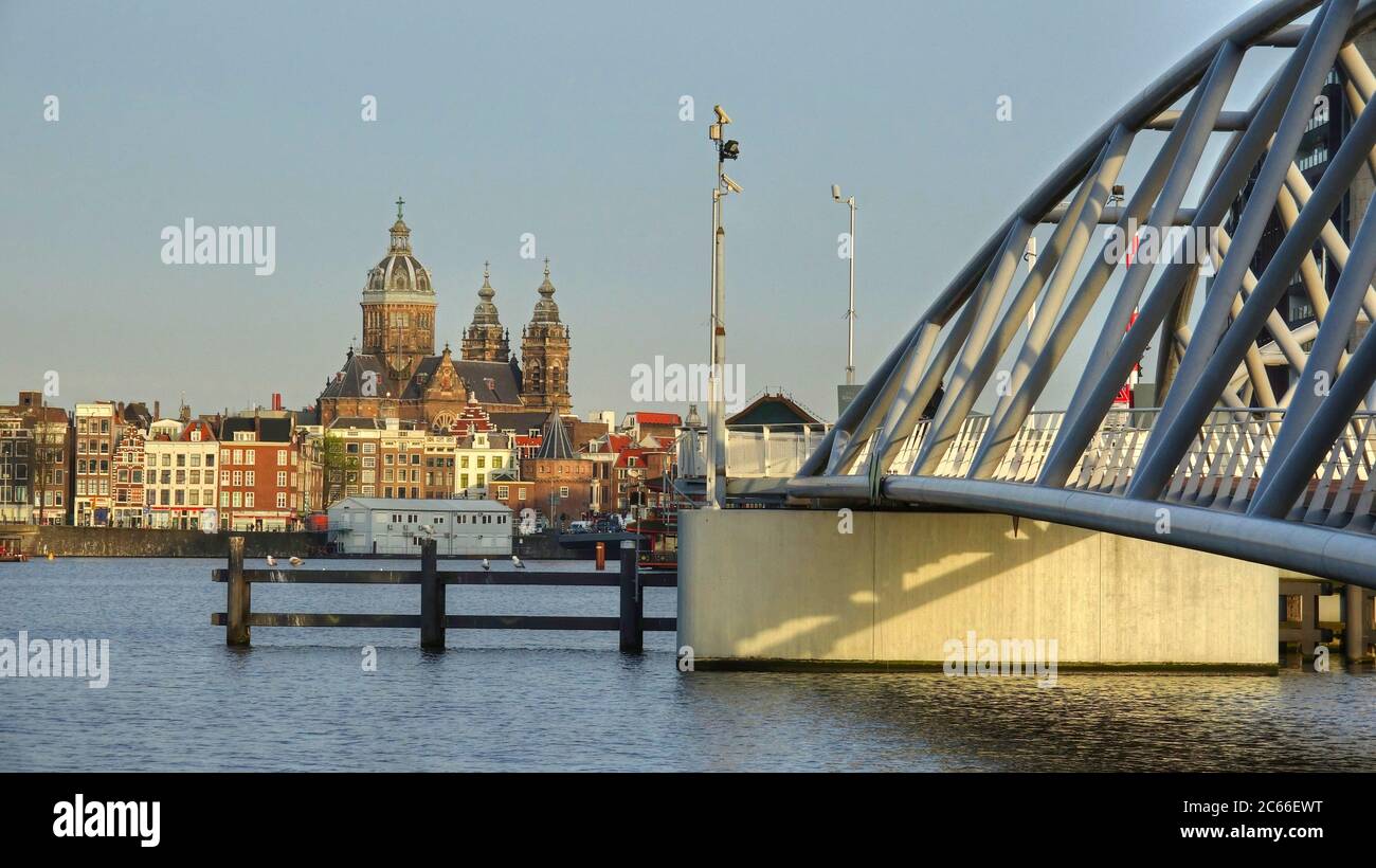 Oosterdok and basilica of saint nicholas hi-res stock photography and ...