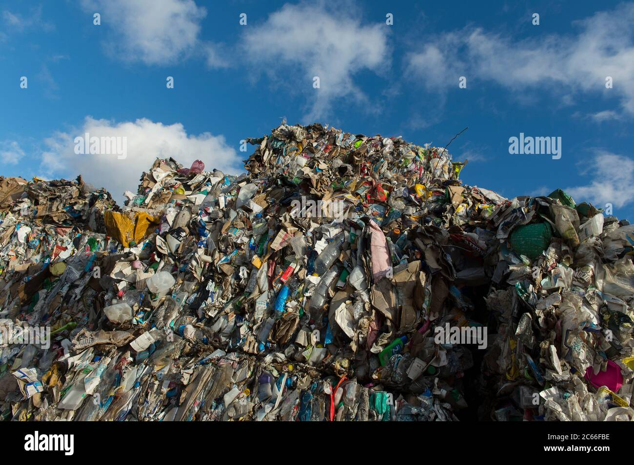Piles of cardboard at a recycling plant in Liverpool, England, UK Stock ...