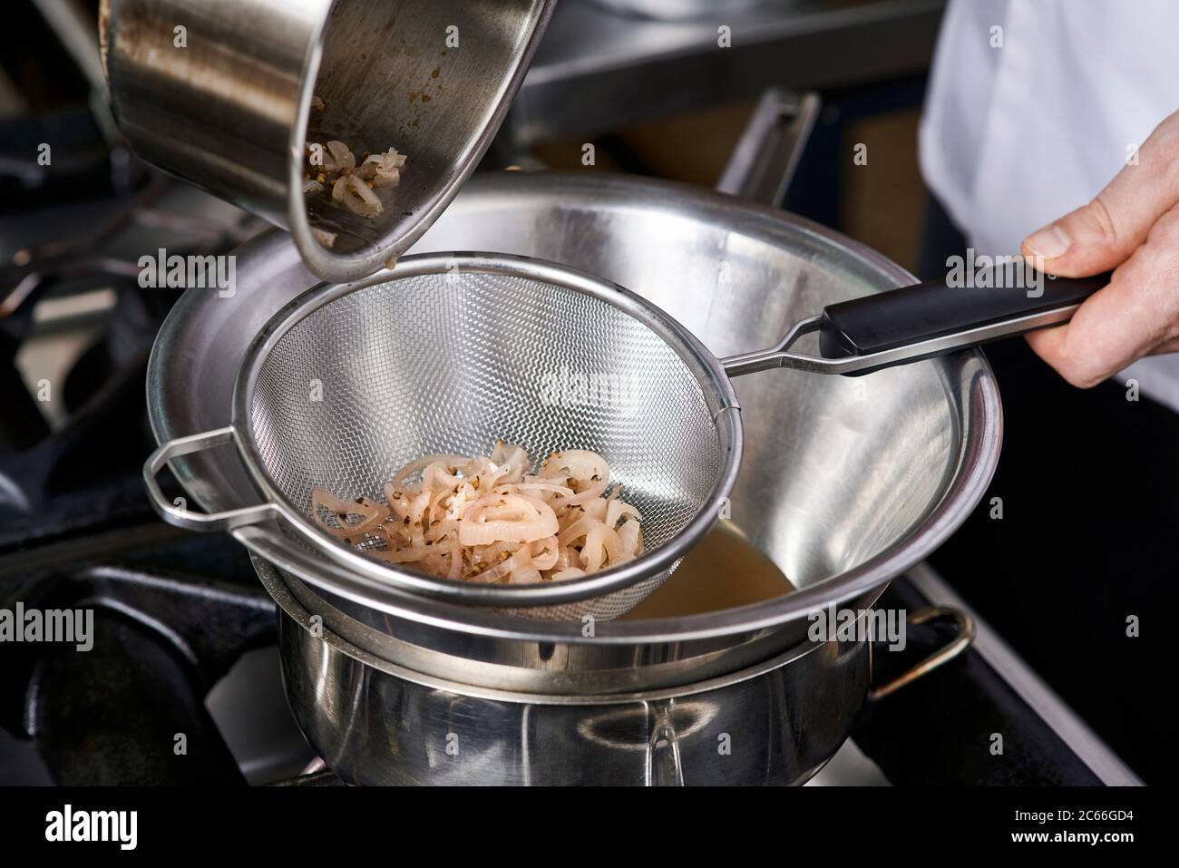 Preparation of Béarnaise Sauce step by step, reduction being strained ...
