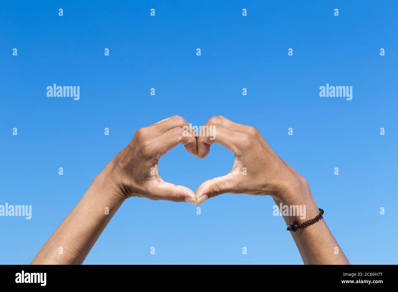 Heart shaped hands Stock Photo - Alamy