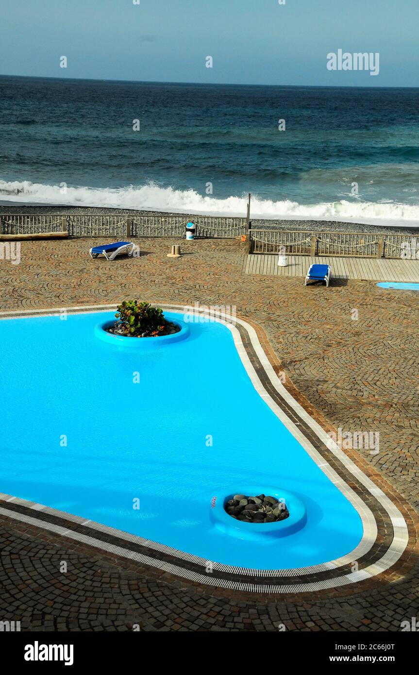 Blue Swimming Pool near the Atlantic Ocean Stock Photo - Alamy