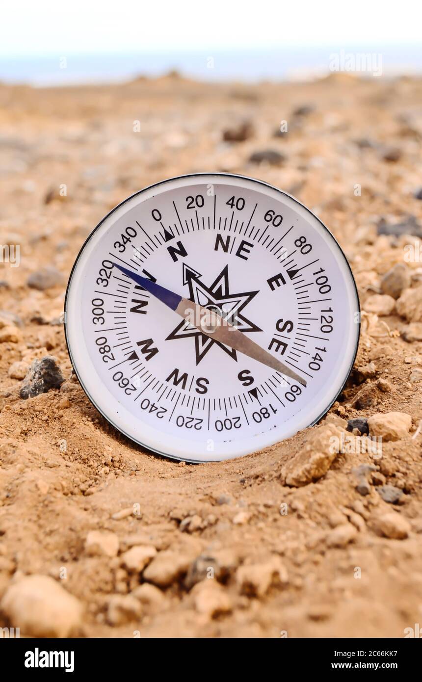 Orientation Concept Metal Compass on a Rock in the Desert Stock Photo ...