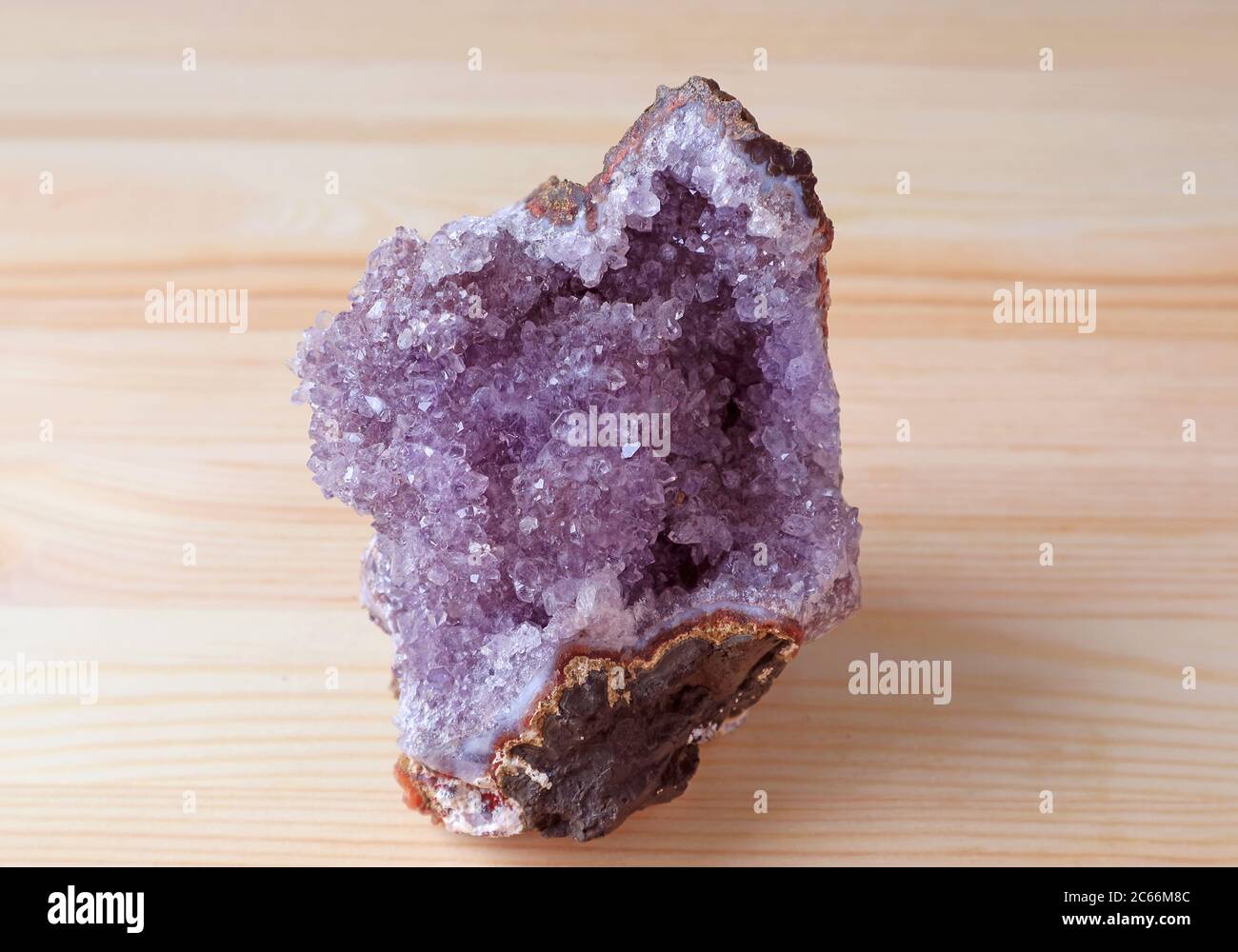Natural Amethyst Stone Cluster Isolated on Wooden Background Stock ...