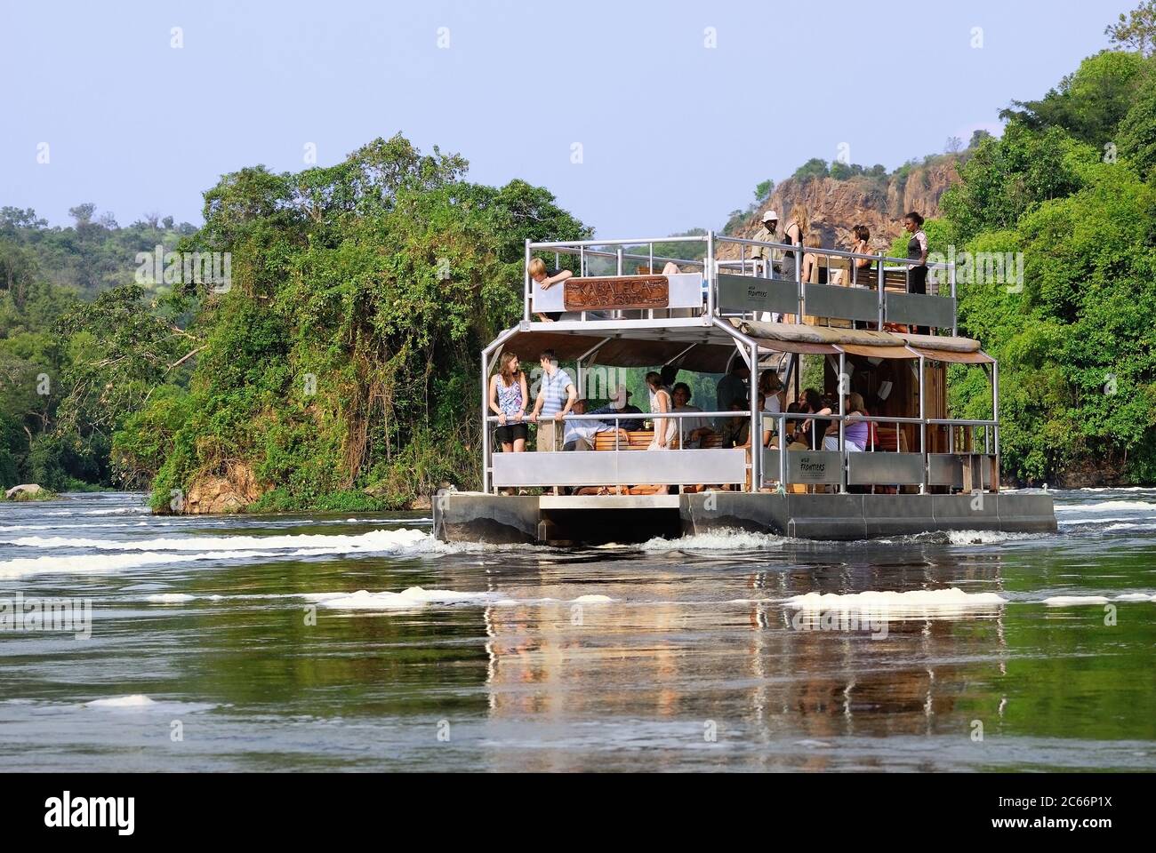 UGANDA - AUG 27, 2010: Tourists visit the Murchison Falls, also known ...