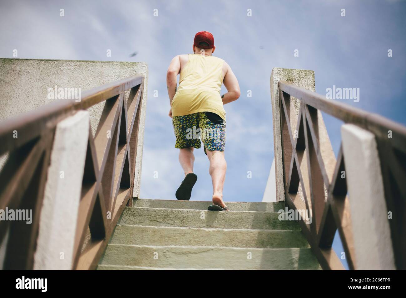 Man going upstairs hi-res stock photography and images - Alamy