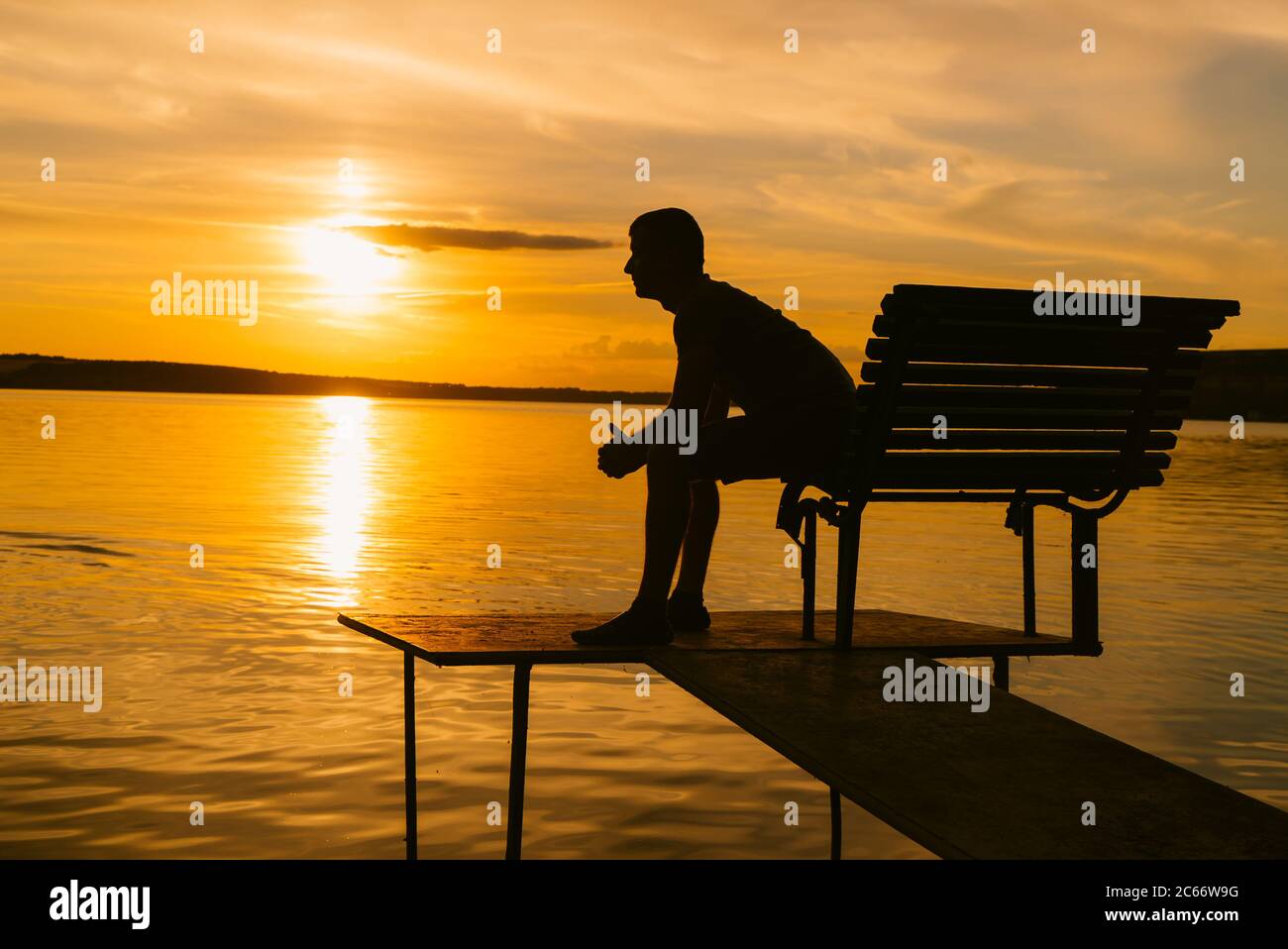 Black man sitting bench trees hi-res stock photography and images - Alamy