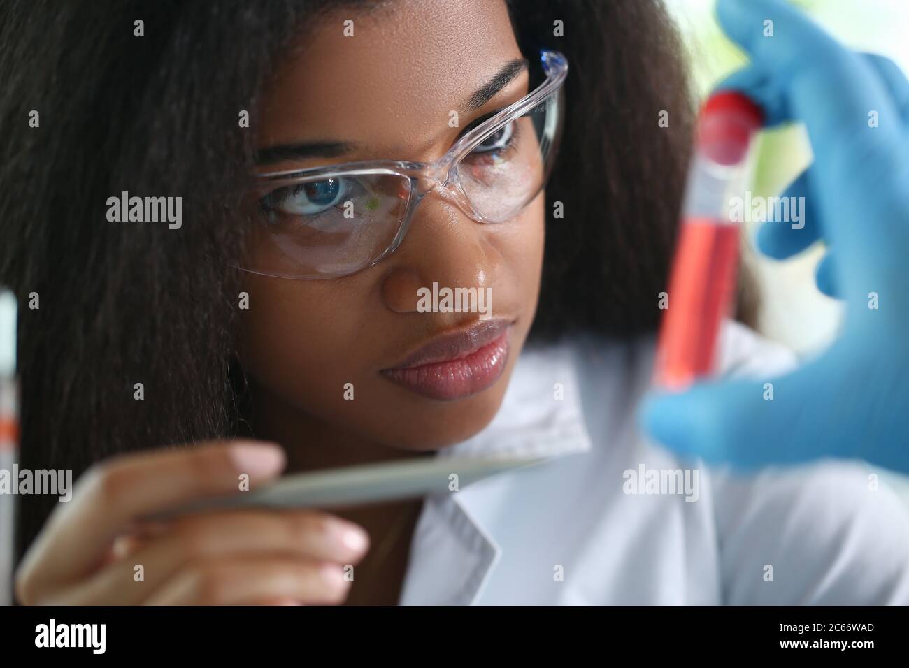 Female glass worker glasses hi-res stock photography and images - Alamy