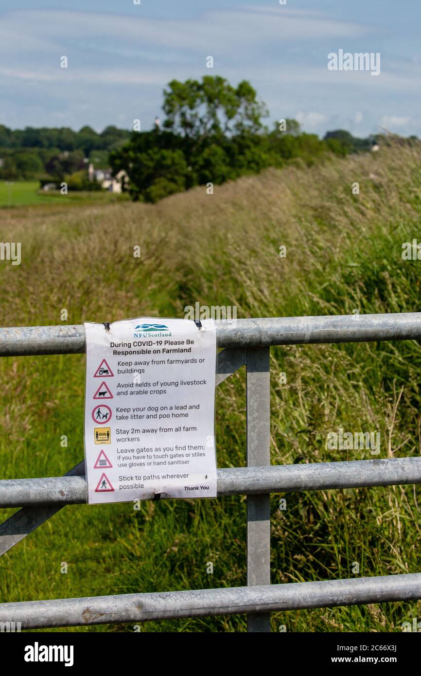 Nfu Covid warning sign on farm gate Scotland UK Stock Photo - Alamy