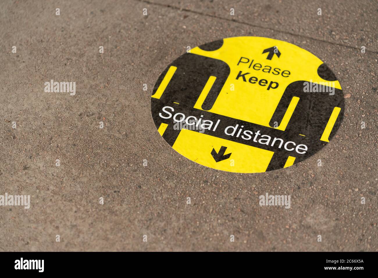 Please keep social distance floor vinyl sticker Stock Photo - Alamy