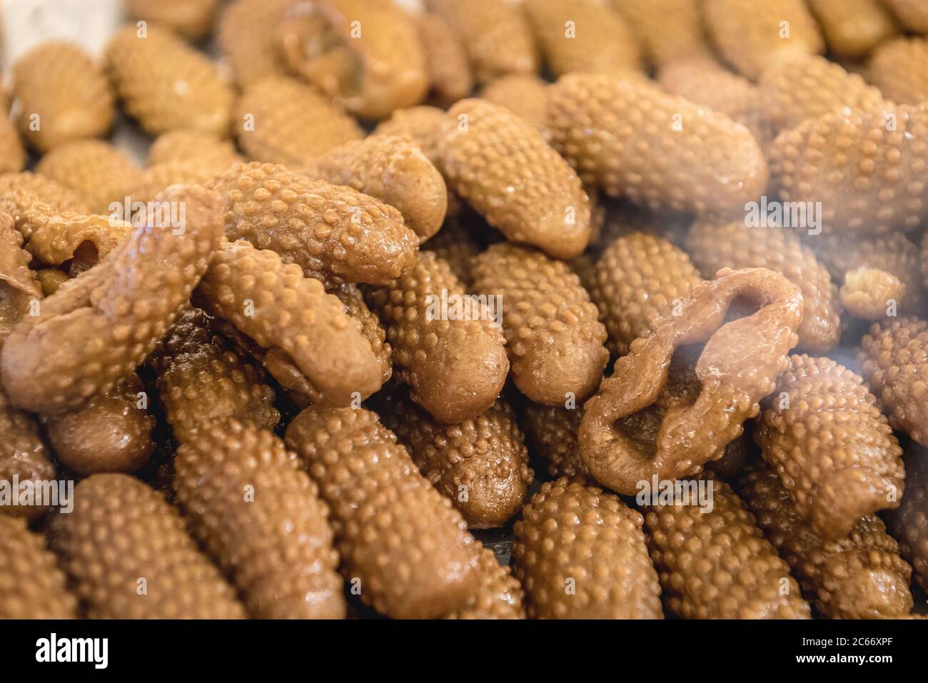 Close up on a pieces of sweets called Maakaroun in Lebanese patisserie ...