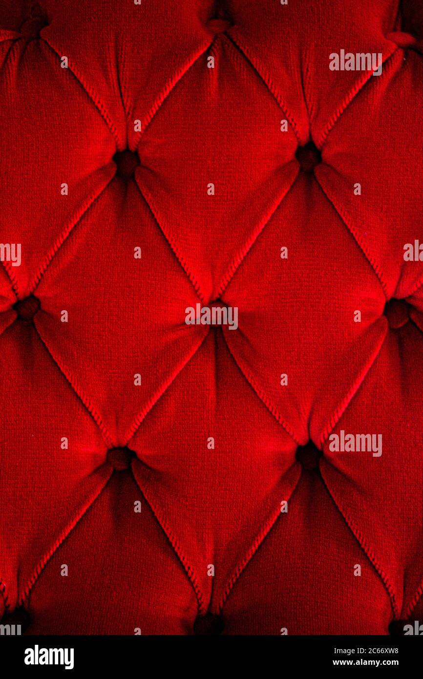 red fabric background with buttons that make diamonds Stock Photo - Alamy