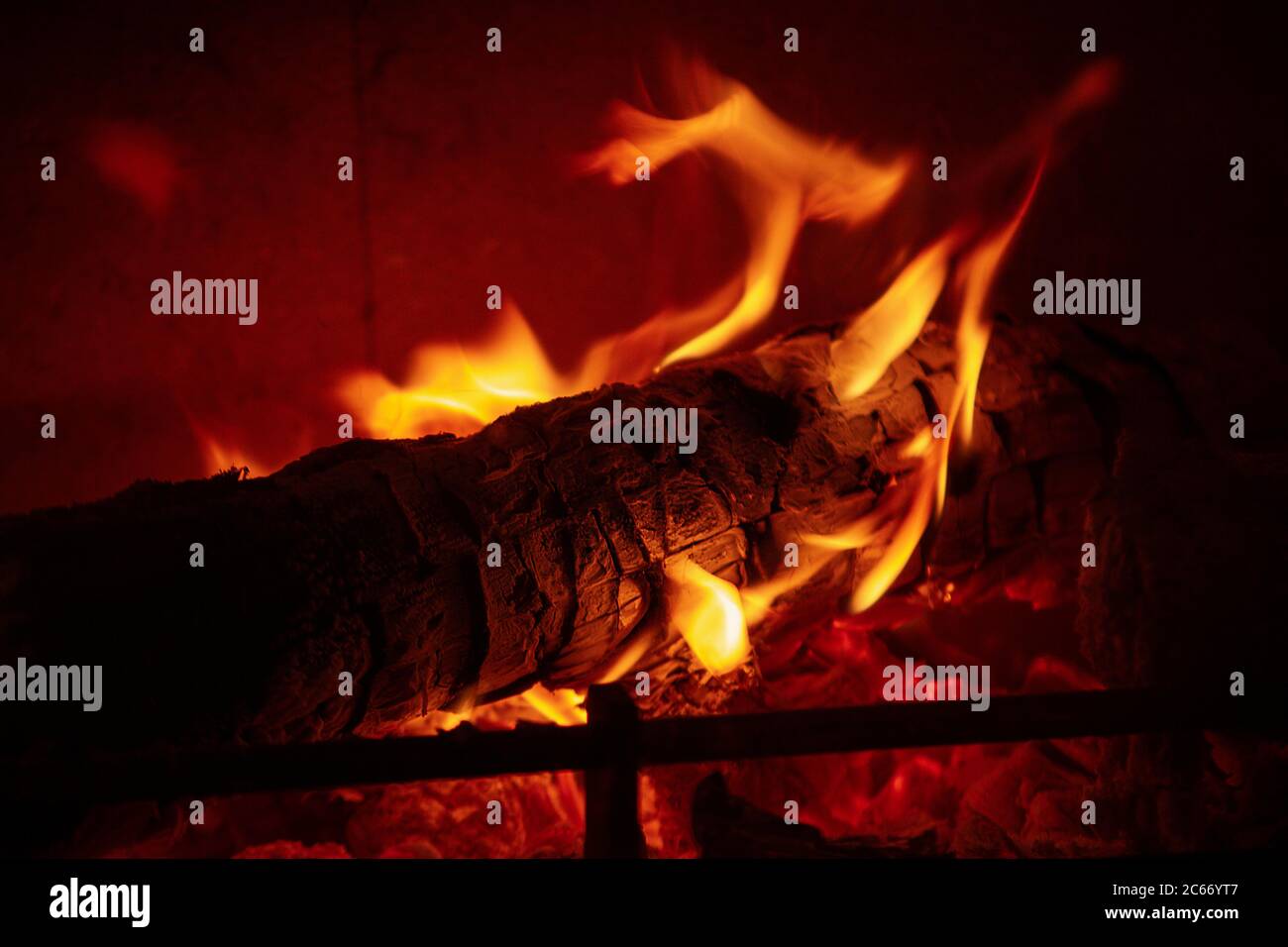 Natural fireplace burning wallpaper Stock Photo - Alamy