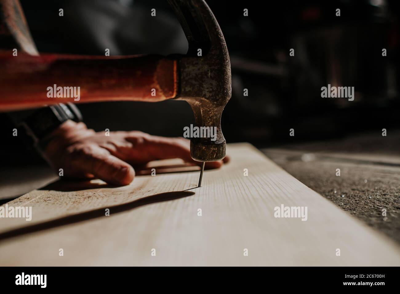 closeup of hammer hitting nail Stock Photo - Alamy
