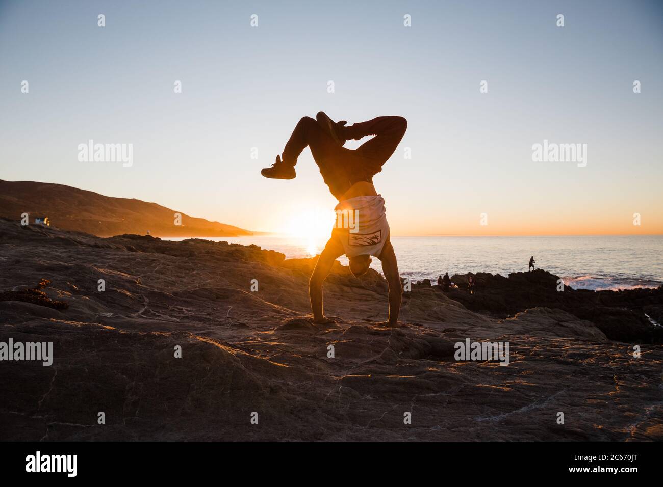 Hand stand beach hi-res stock photography and images - Alamy