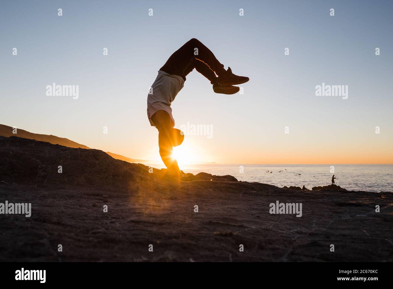 Balancing man silhouette hi-res stock photography and images - Alamy
