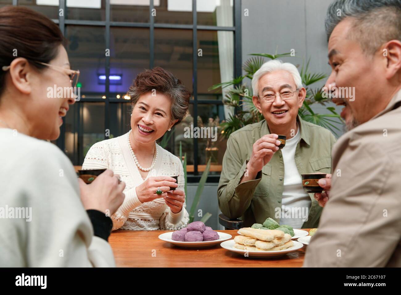 Elderly Young Tea Party High Resolution Stock Photography and Images ...