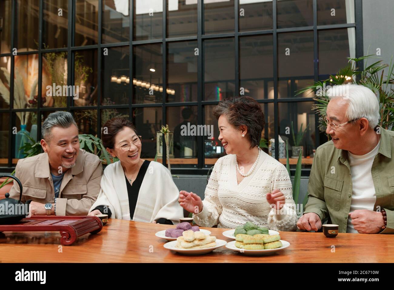 Elderly young tea party hi-res stock photography and images - Alamy