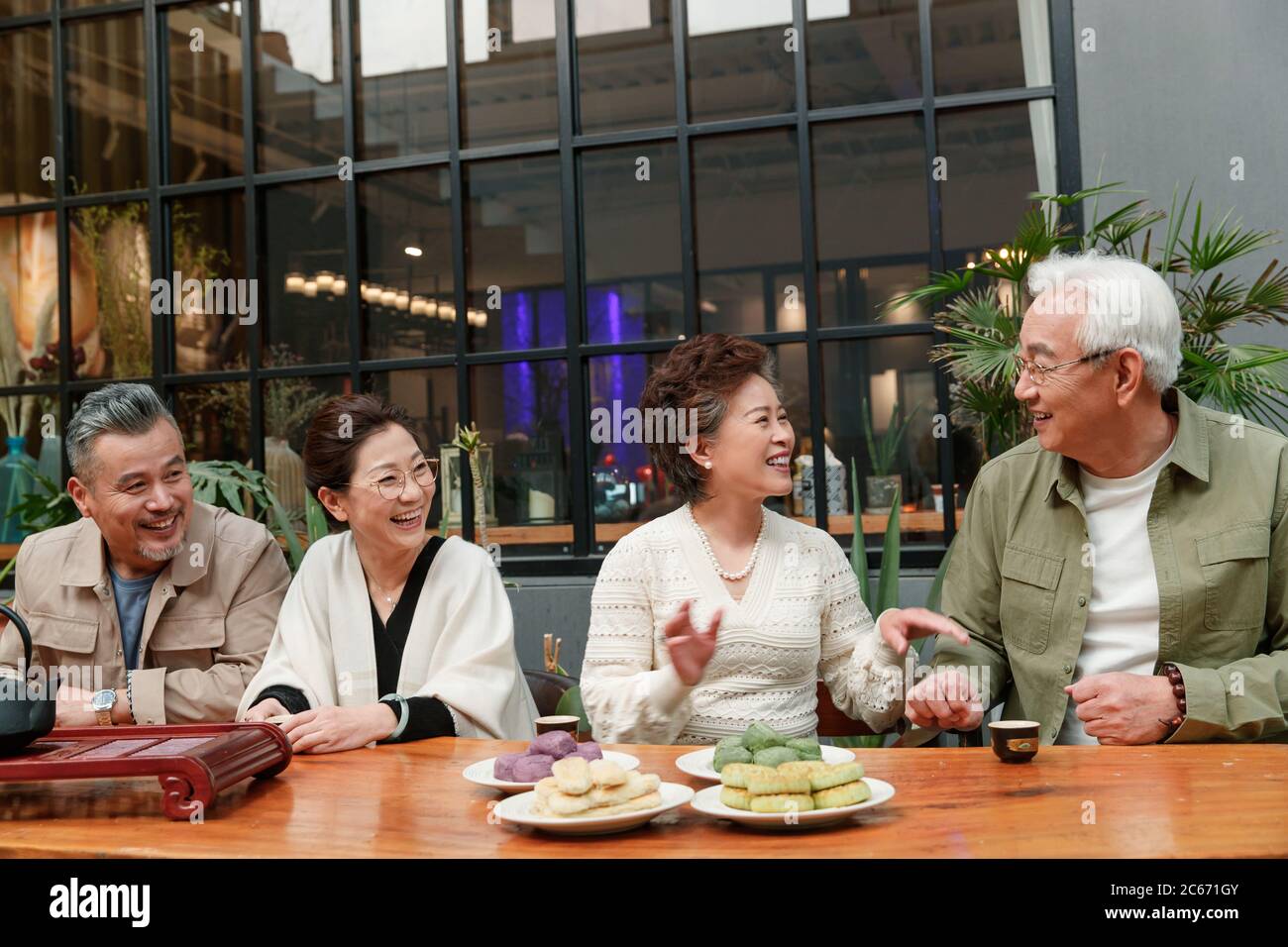 Elderly young tea party hi-res stock photography and images - Alamy