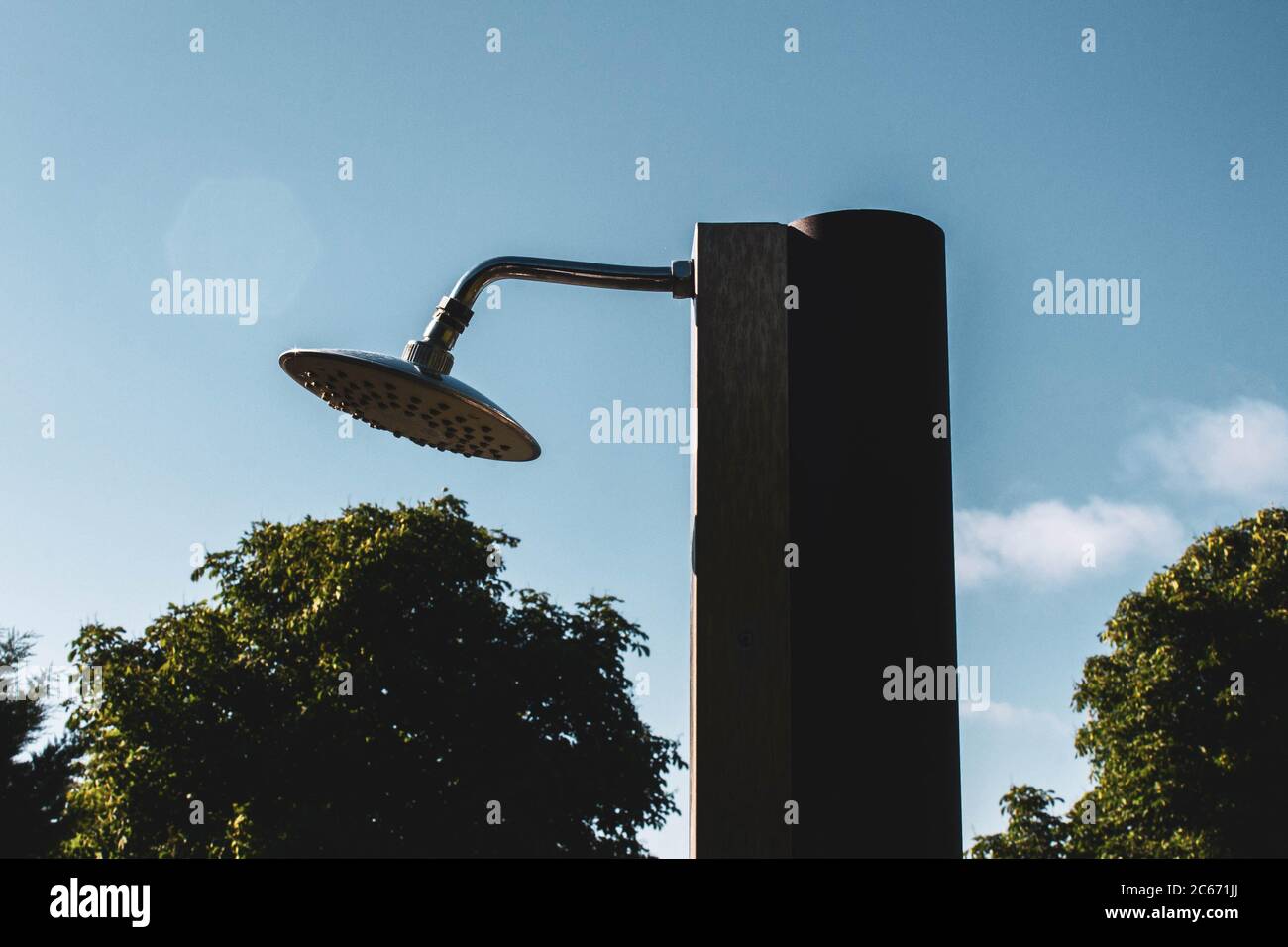 pool shower head surrounded by nature Stock Photo - Alamy