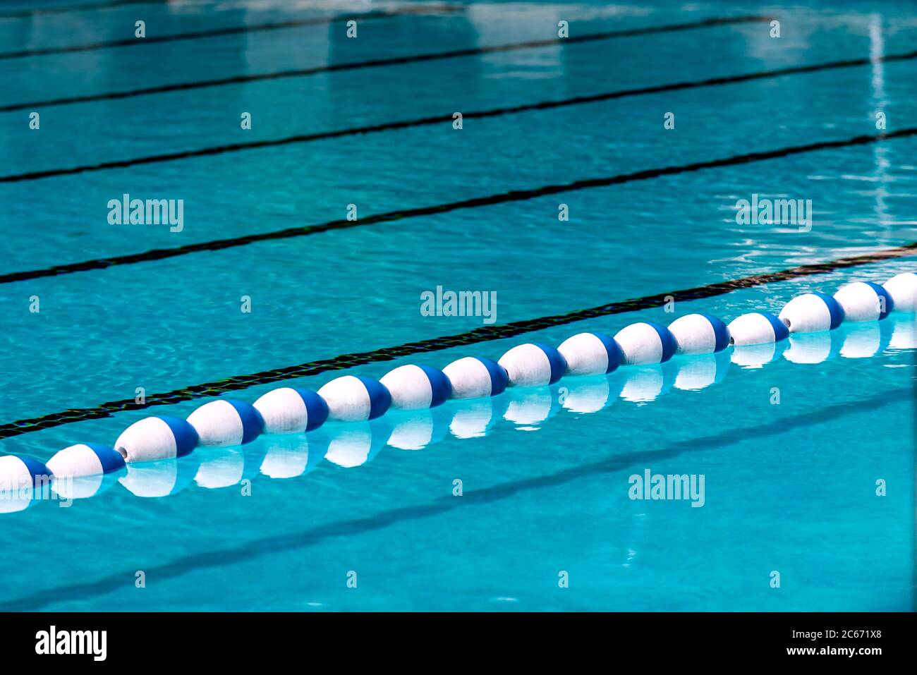Floating lane divider in a swimming pool Stock Photo - Alamy