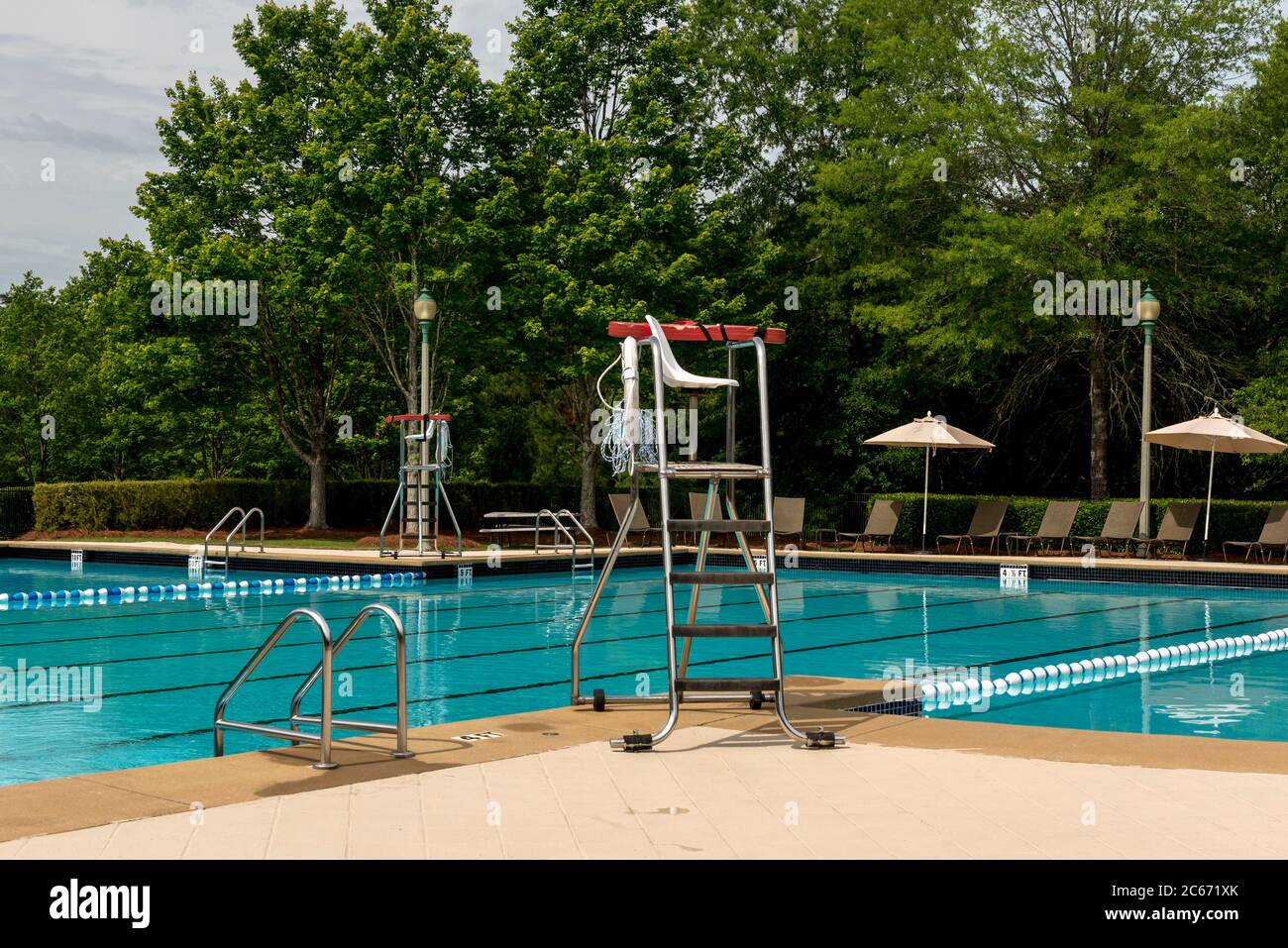 Swimming pool details with a lifeguard stand Stock Photo - Alamy