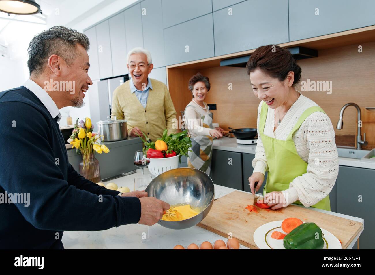 The elderly in the kitchen cooking Stock Photo - Alamy