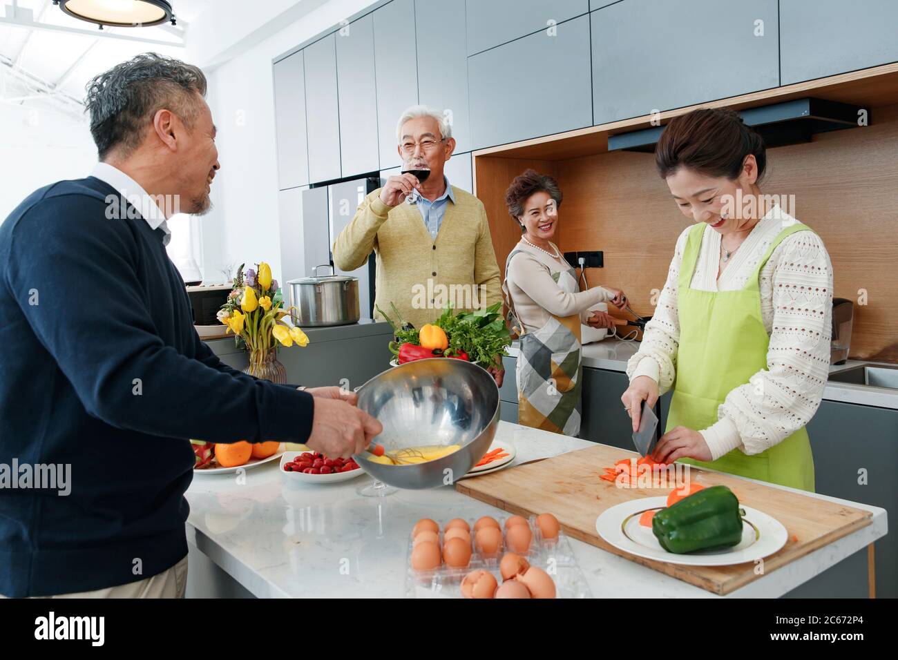 The elderly in the kitchen cooking Stock Photo - Alamy