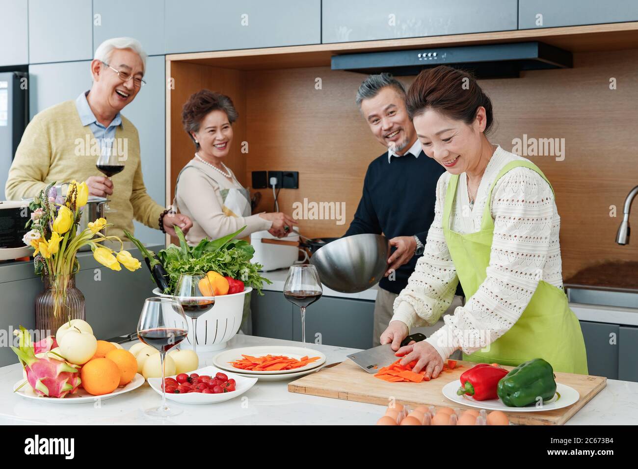 The elderly in the kitchen cooking Stock Photo - Alamy