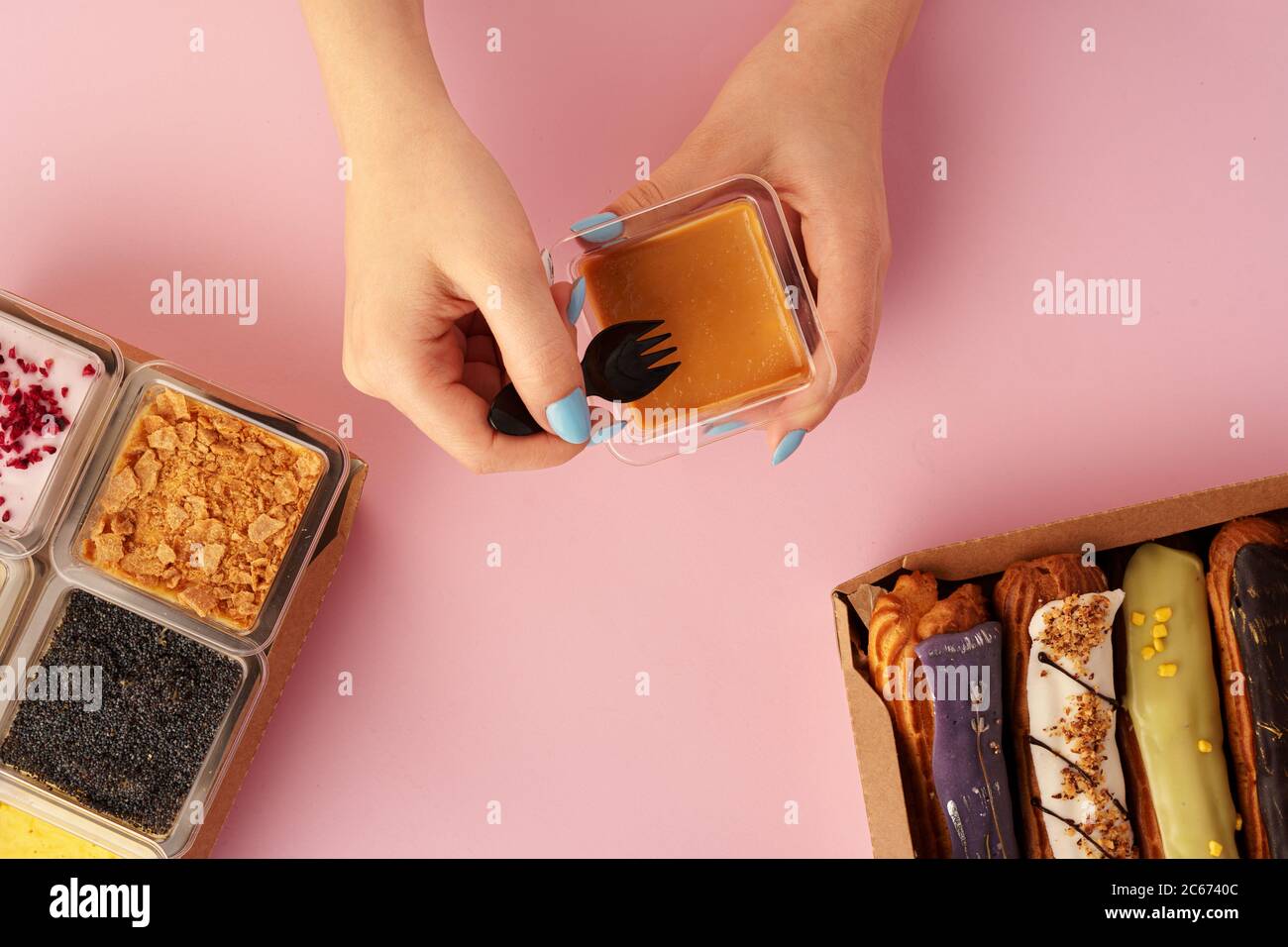 Female hands holding dessert in hands among fresh confectionary Stock ...