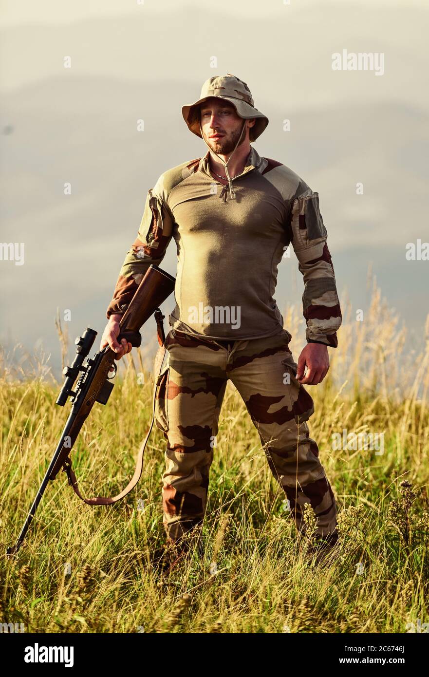 Ready to shoot. Army forces. Man military clothes with weapon. Focus ...