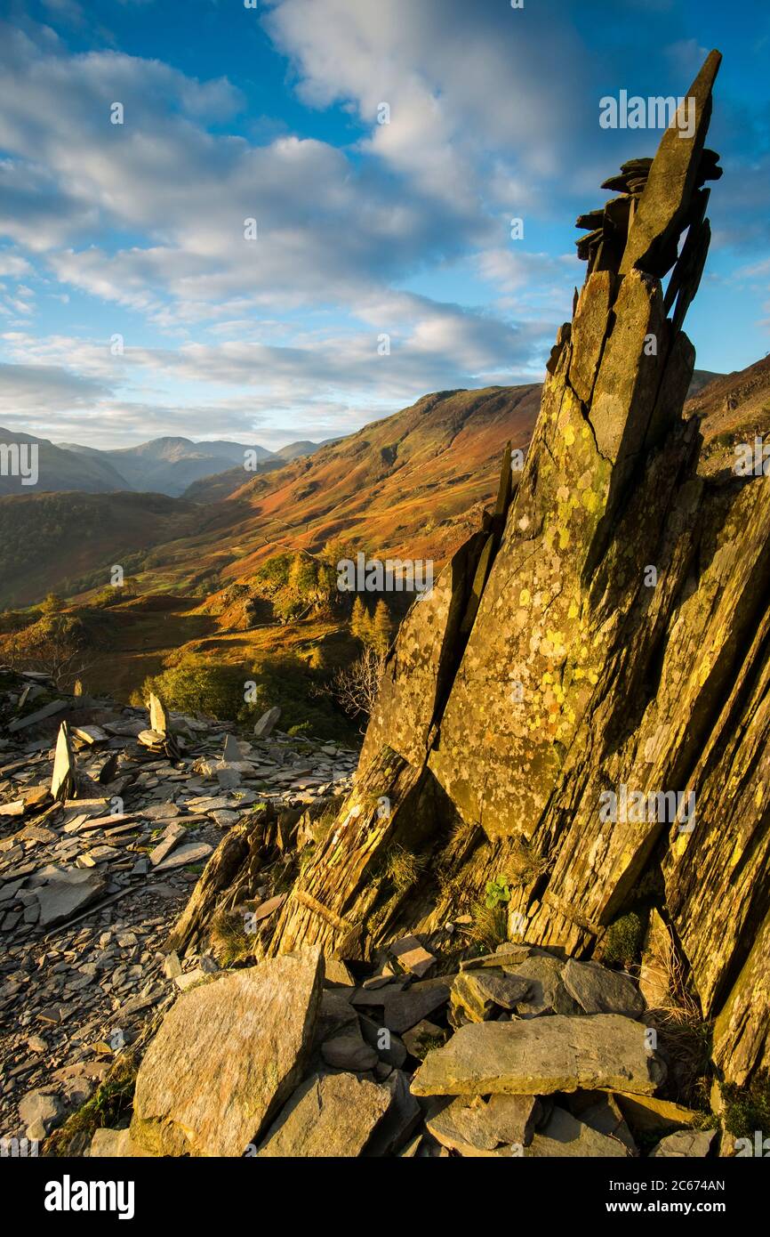 Slate formations and sculptures on Castle Crag on an autumn morning ...