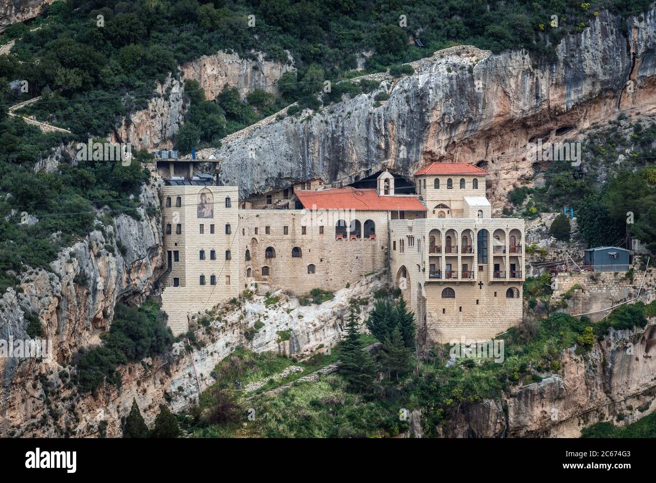 Our Lady of Hamatoura located in village of Kousba, in the rocky hollow ...