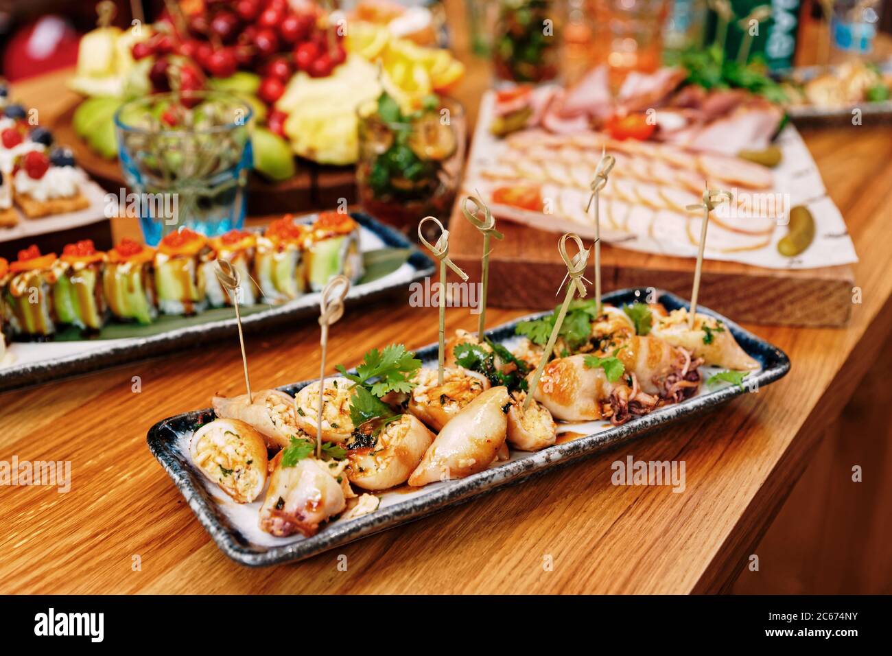 Stuffed squid cooked in Asian style with cilantro, and another food ...