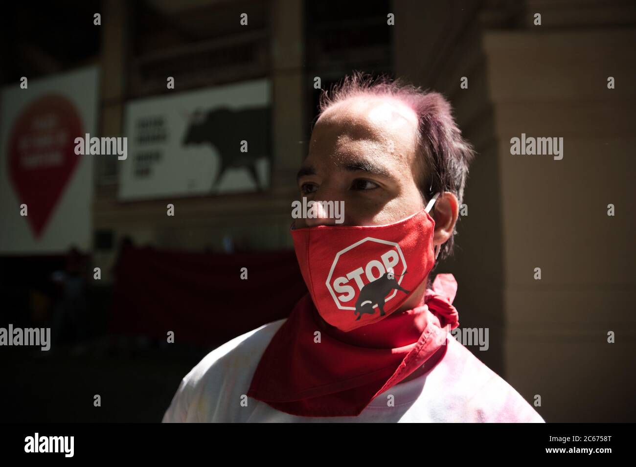 Pamplona, Spain. 07th July, 2020. A protester wearing an anti bullfight ...