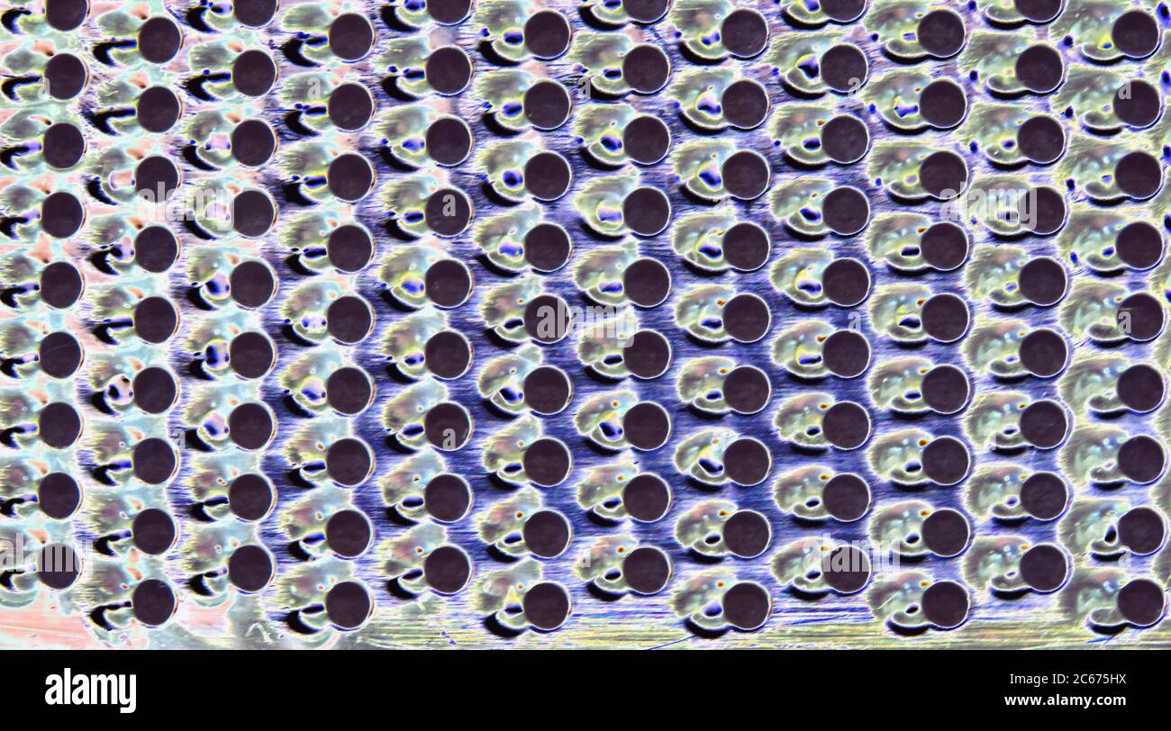 Abstract isolated macro of back of flat cheese grater texture Stock ...