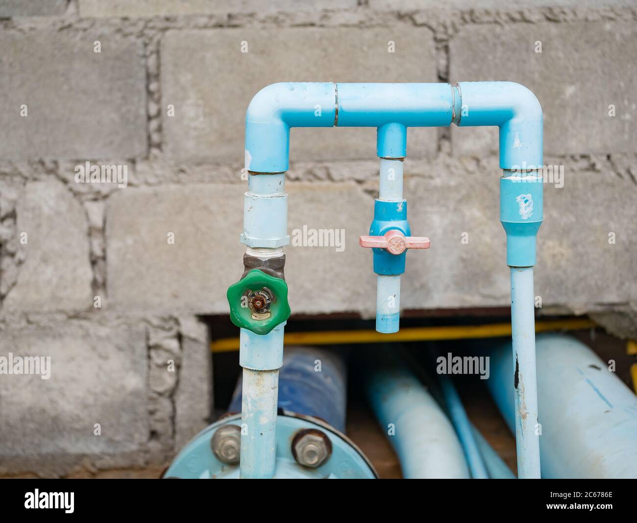blue water pipe with valve, Plumbing work Stock Photo - Alamy