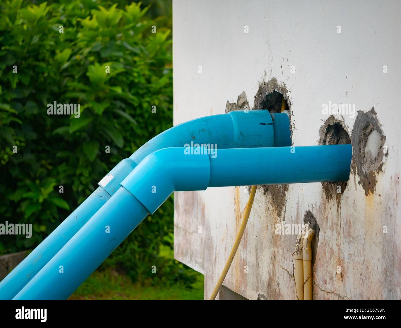 big blue water pipe for Plumbing work Stock Photo - Alamy