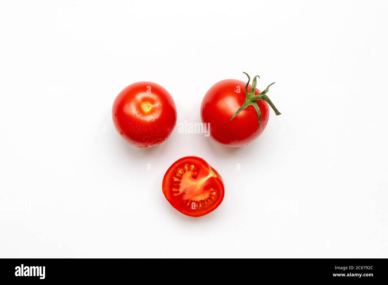 Fresh cherry tomatoes with water drop isolated on white background, top ...