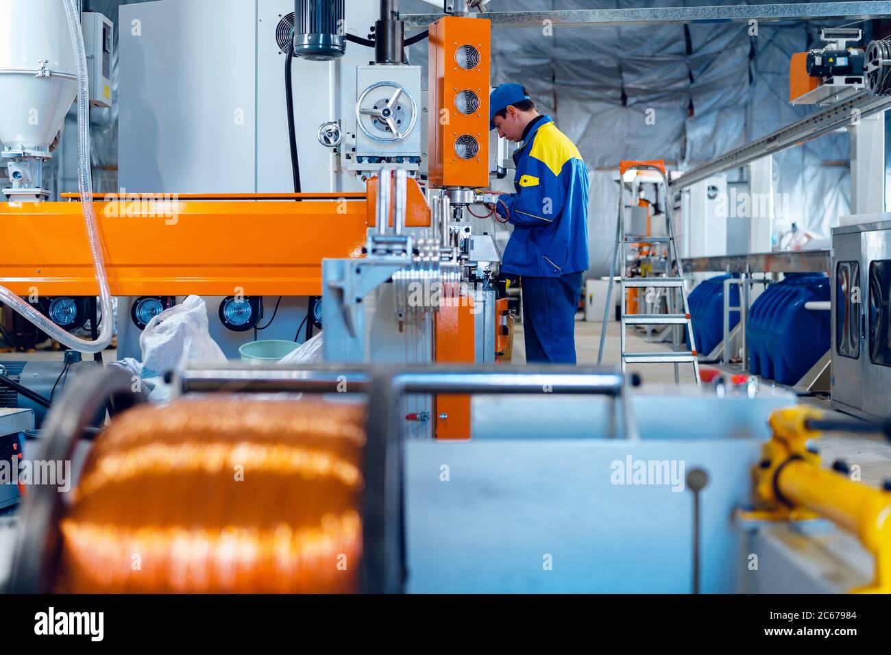 Production of copper wire, cable in reels at factory. Cable factory ...