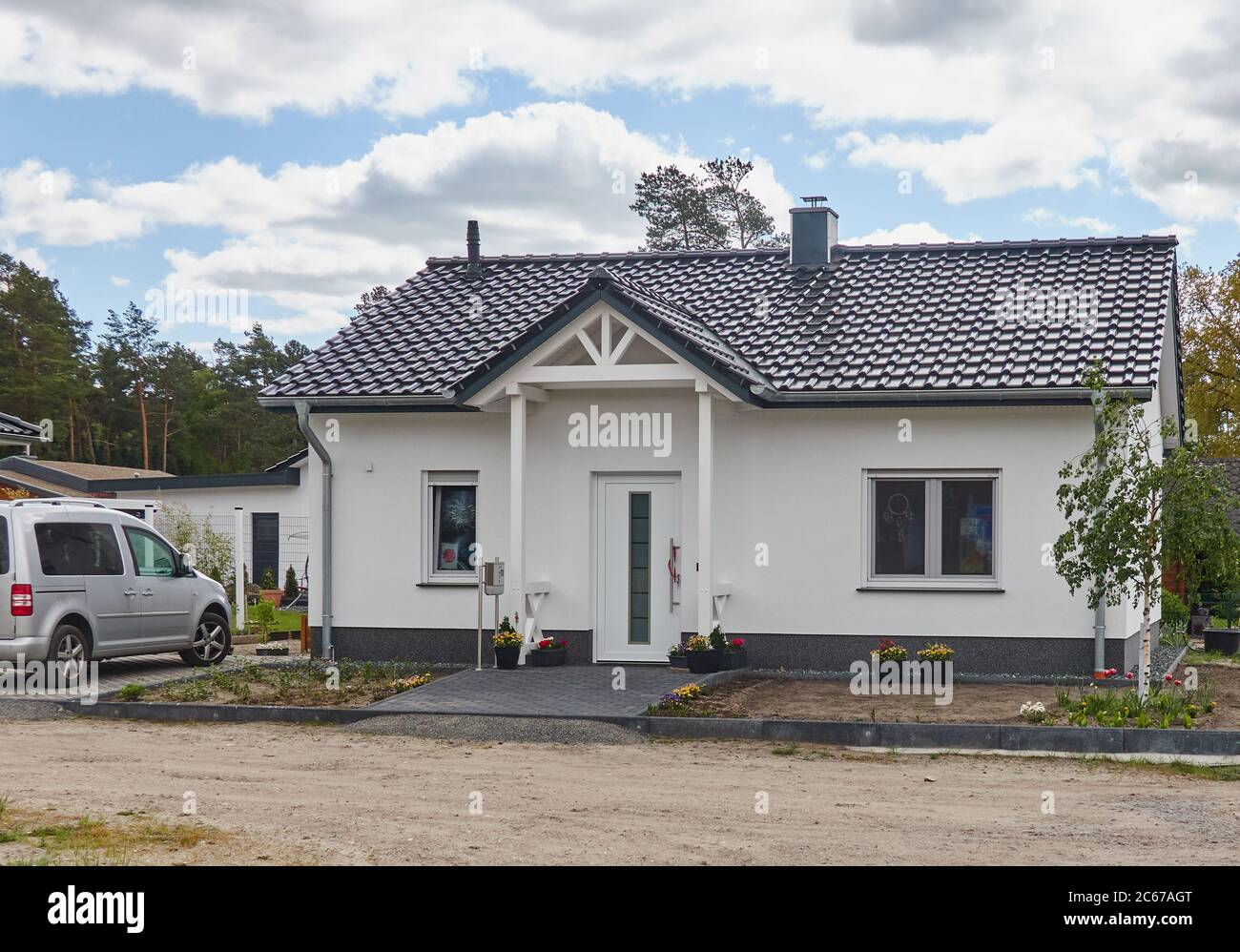Pitched roof garden house hi-res stock photography and images - Alamy