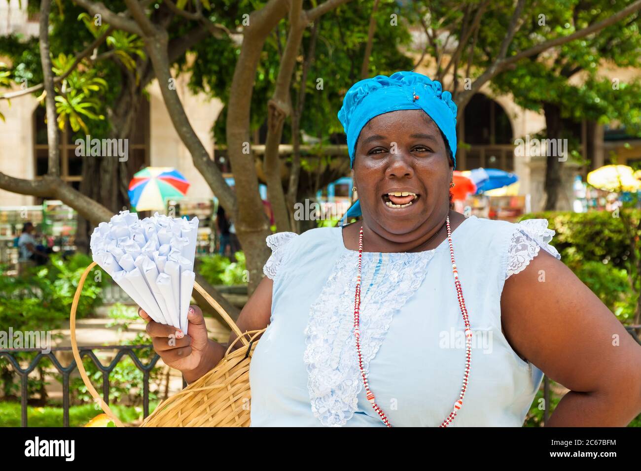 Girl selling peanuts hi-res stock photography and images - Alamy