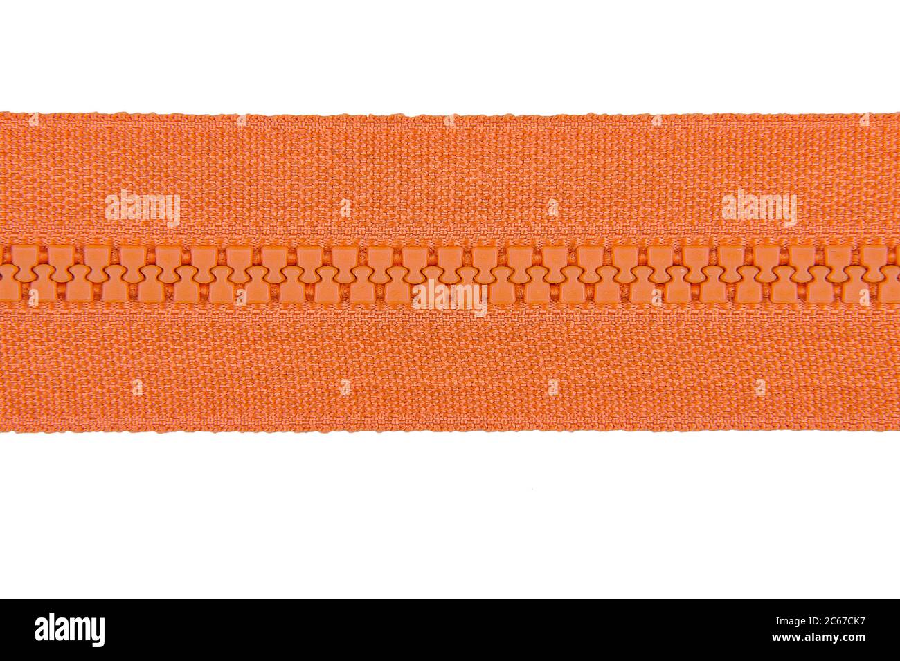 Closed orange zipper isolated on white background. Orange zipper for ...