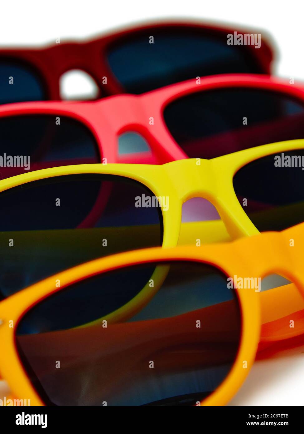 Colorful sunglasses on white background Stock Photo - Alamy