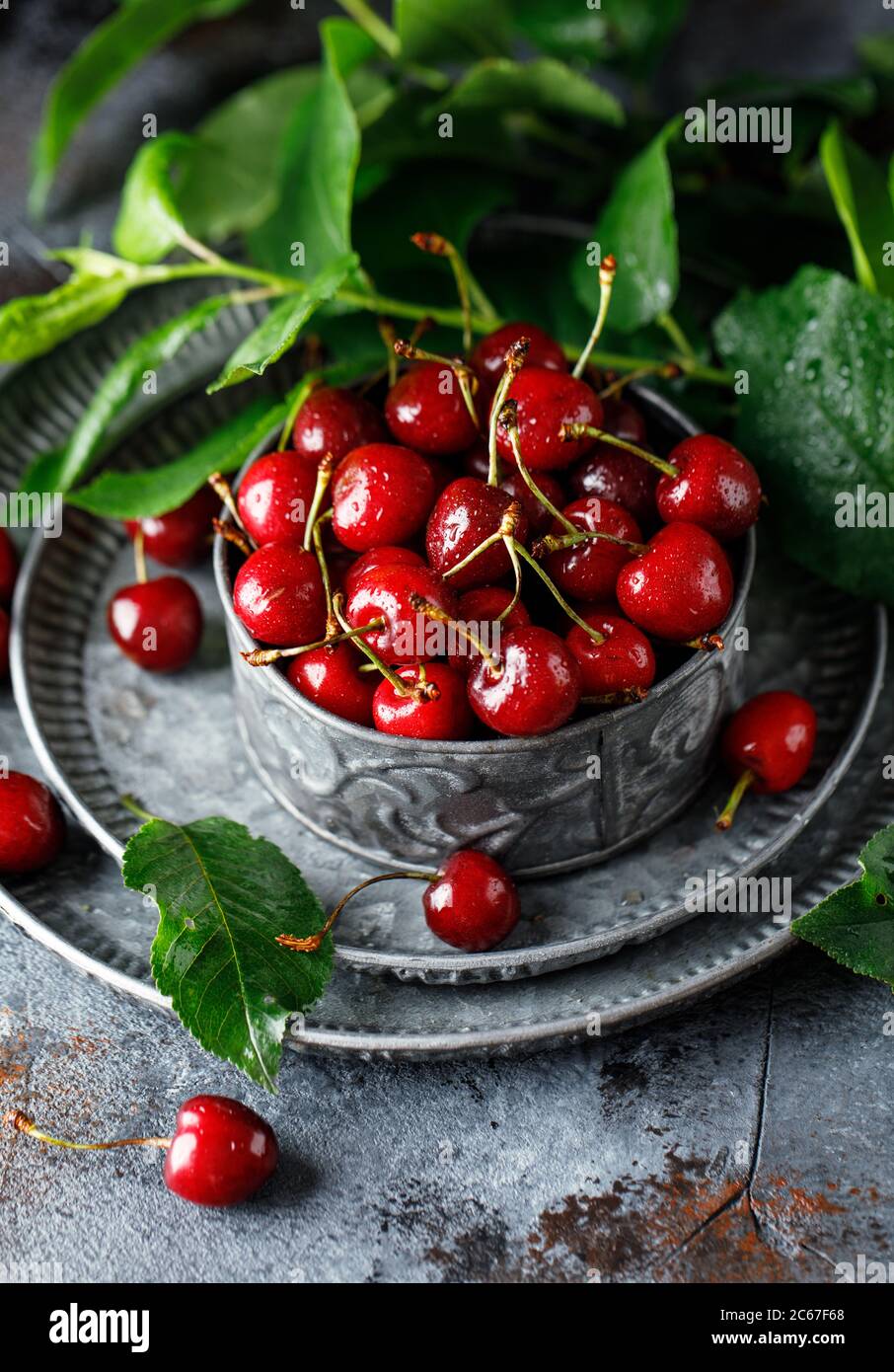 Fresh sweet cherries on table with water drops. Cherry background. Food ...