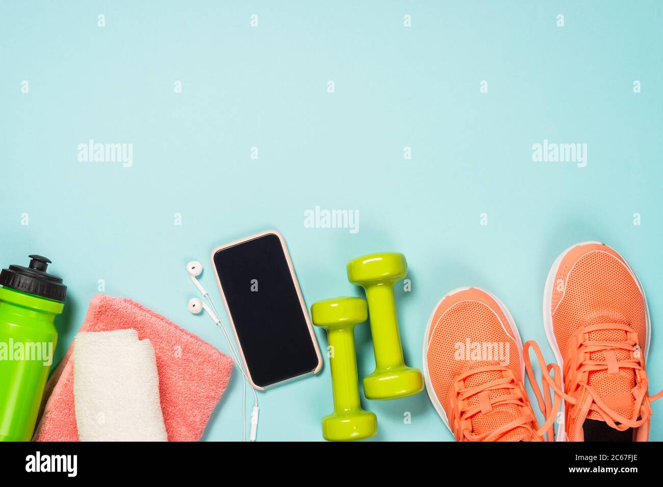 Fitness equipment at blue background top view Stock Photo - Alamy